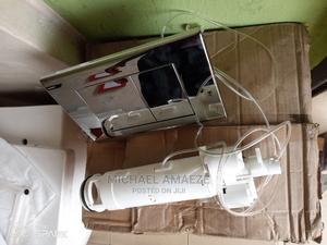 Complete Pebble Faceplate Stainles / White Wall Hung Button in Orile ...