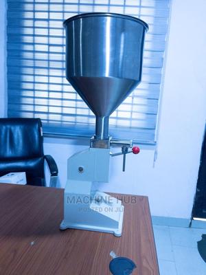 Hand Held Liquid Manual Filling Machine in Amuwo-Odofin - Manufacturing ...