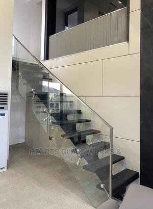 Frameless Glass Staircase With Spider Clamp in Lekki - Building ...