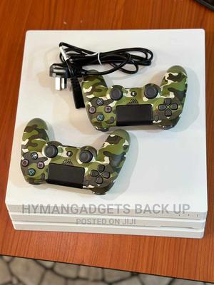 Sparkling White Grade a London Used Ps4 Pro With 2 Pad in Ikeja - Video Game Consoles, Nkechi ...