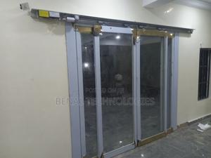 Glass Entry Door With Motion-Activated System in Dakibiyu - Building ...