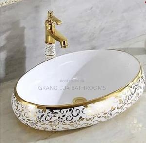 Elegant Gold-Trimmed Ceramic Wash Basin With Ornate Floral D in Orile ...
