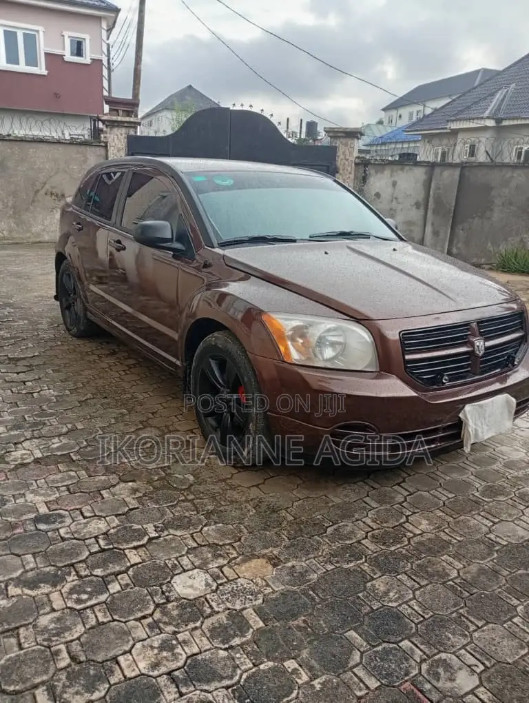Dodge Caliber 2011 Burgundy in Calabar - Cars, Ikorianne Motors | Jiji.ng