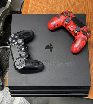Uk Used Ps4 Pro With 2 Controllers and 15 Games Inside in Ikeja - Video ...