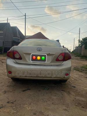 Toyota Corolla 2010 Gold in Asokoro - Cars, Oladipupo James | Jiji.ng