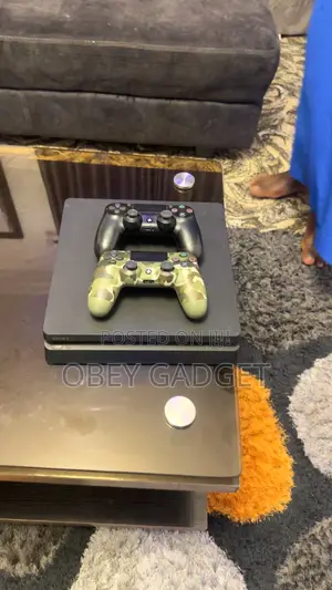 Uk Used Slim Ps4 With Original Kamo Color Pad With 7 Video Games on It ...