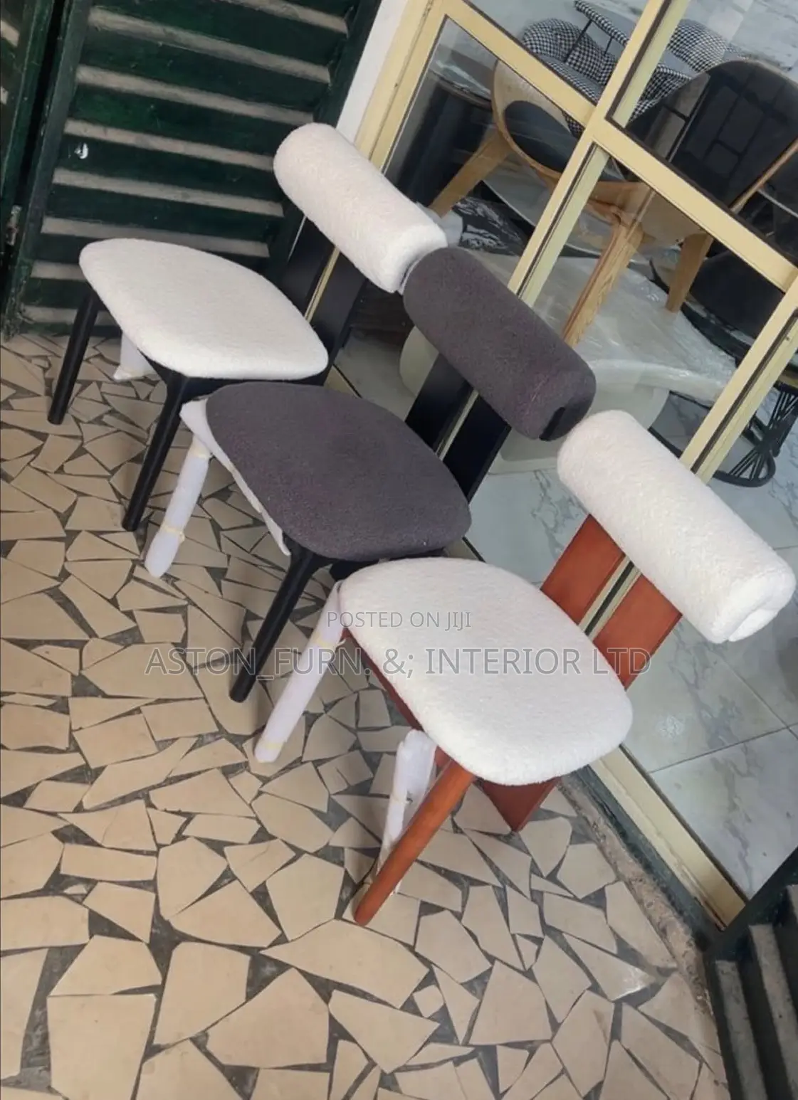 This Is a Set of Modern Dining Chairs Featuring Soft, Textured Upholst ...