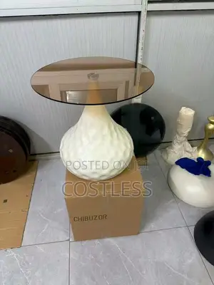 Modern Accent Side Table Featuring a Round, Tinted Brown Glass Top ...