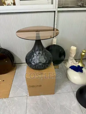 Modern Accent Side Table Featuring a Round, Tinted Brown Glass Top ...